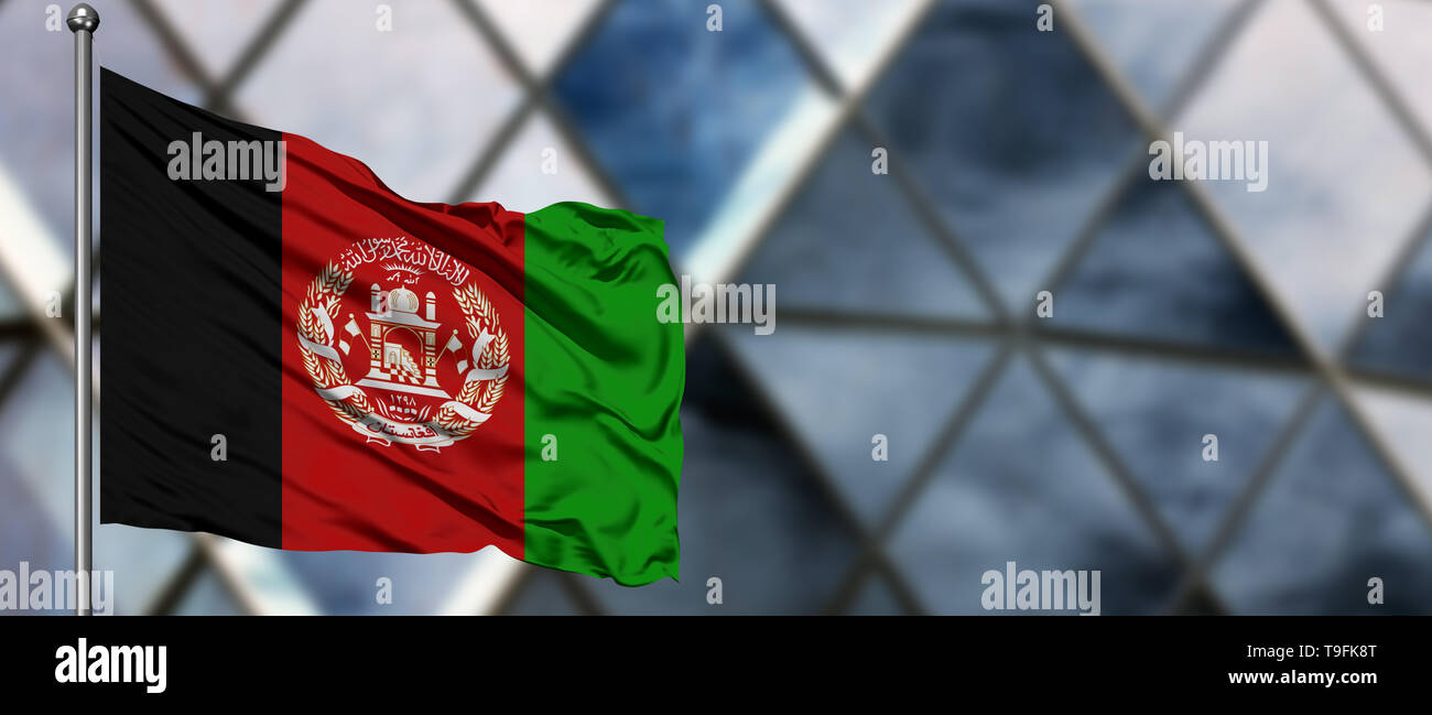 Afghanistan flag waving in the wind against blurred modern building ...
