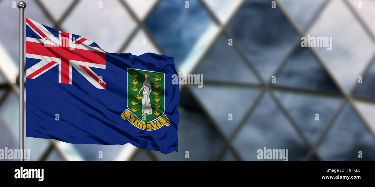 British Virgin Islands flag waving in the wind against blurred modern ...