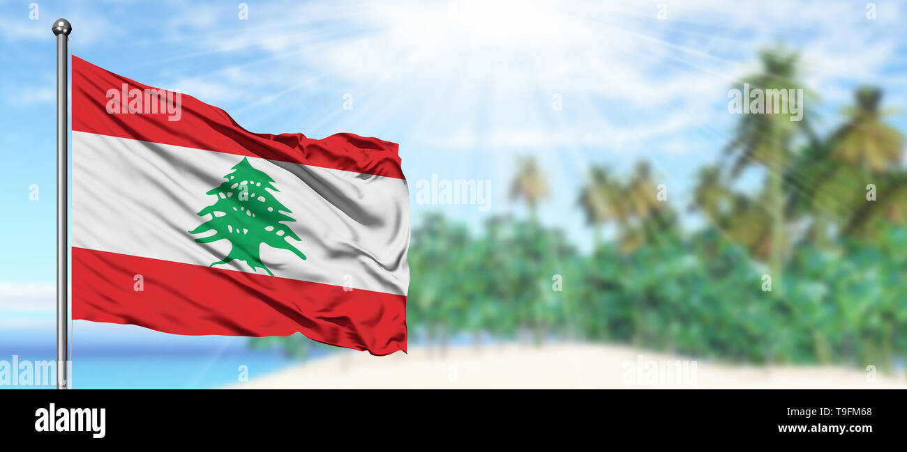 Waving Lebanon flag in the sunny blue sky with summer beach background ...