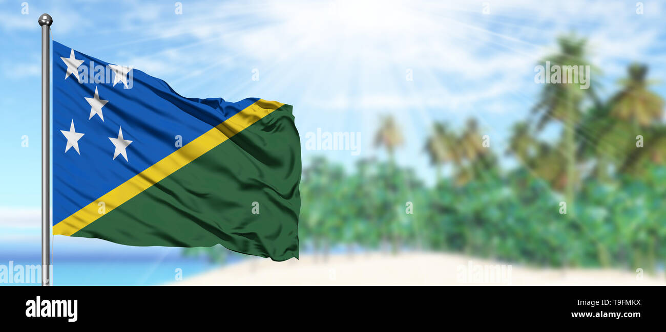 Waving Solomon Islands flag in the sunny blue sky with summer beach ...