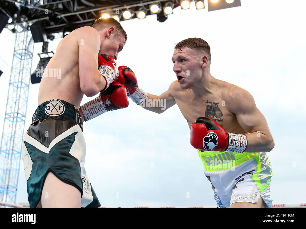 Boy Jones Jr and Shaun Cooper (right) during their WBO Youth Lightweigh ...