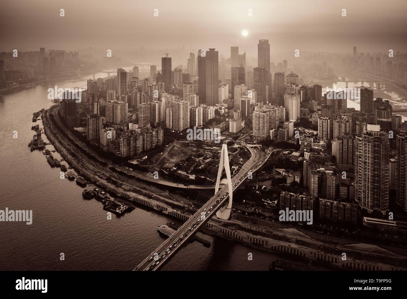 Aerial view of urban buildings and city skyline in Chongqing at sunset ...