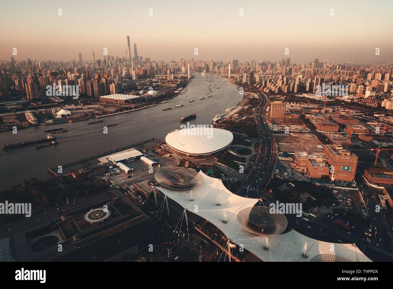 Shanghai Expo Park aerial view from above with city skyline and ...
