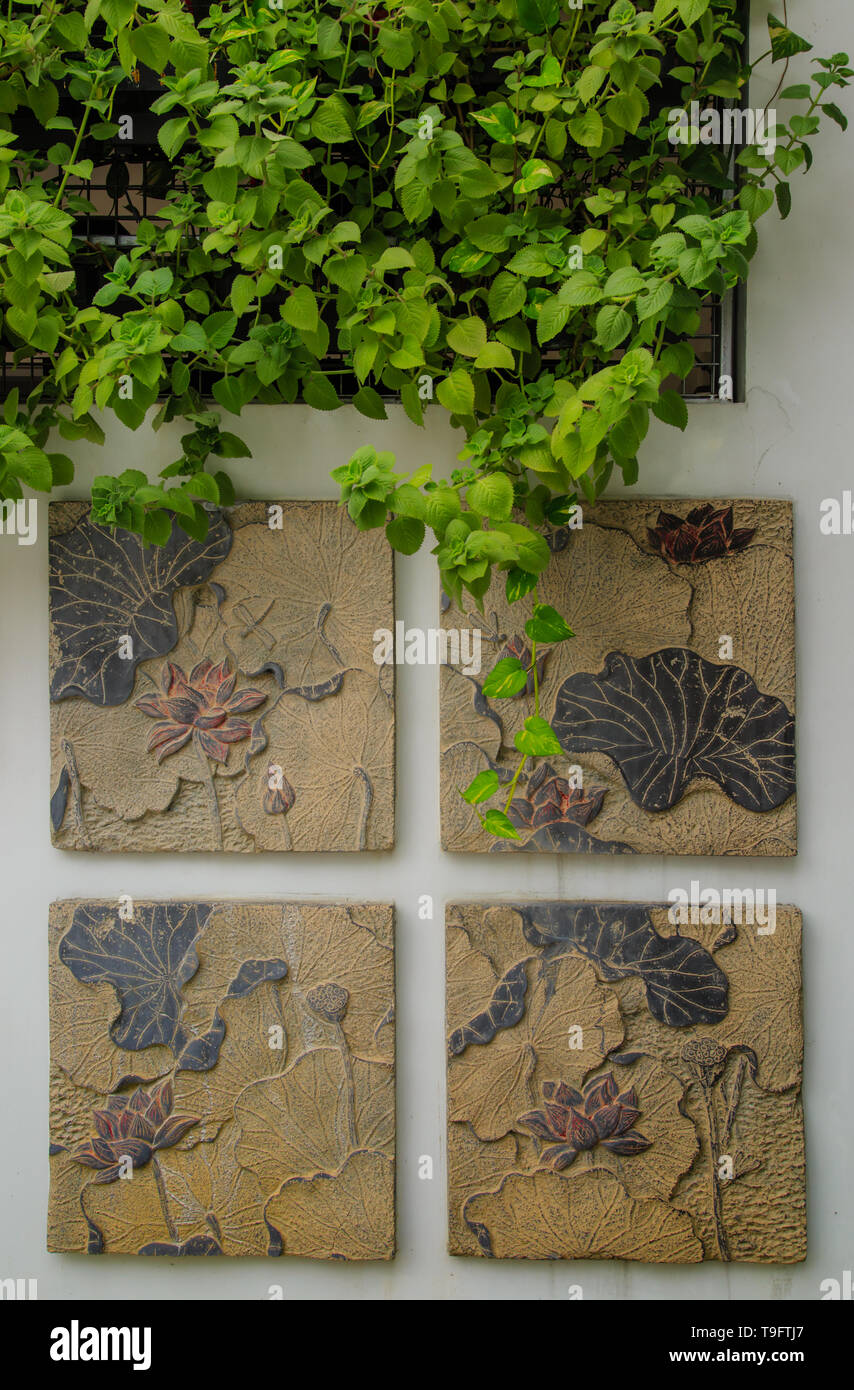 ancient stone relief of lotus Stock Photo - Alamy