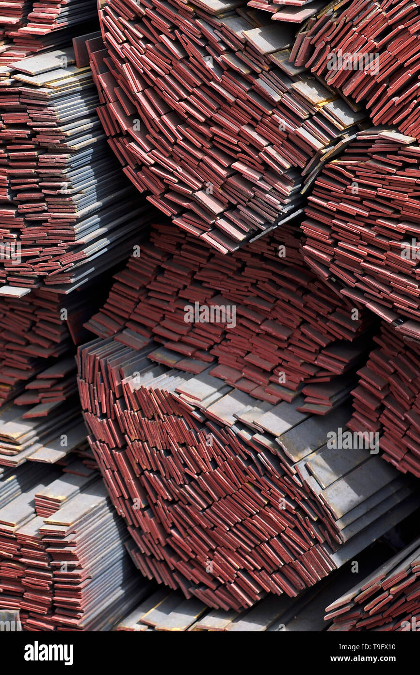 Metal profile strip in packs at the warehouse of metal products, Russia ...