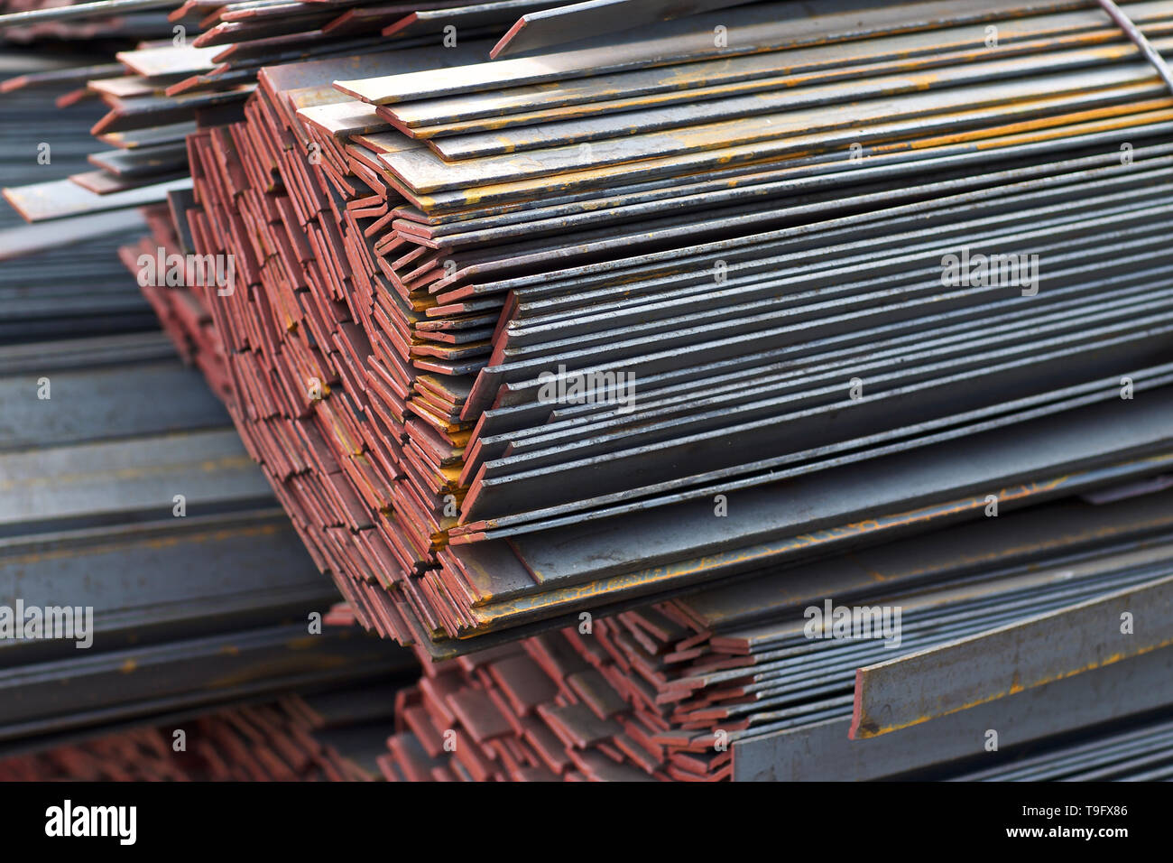 Metal profile strip in packs at the warehouse of metal products, Russia ...
