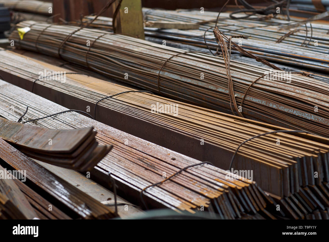 Metal profile strip in packs at the warehouse of metal products, Russia ...