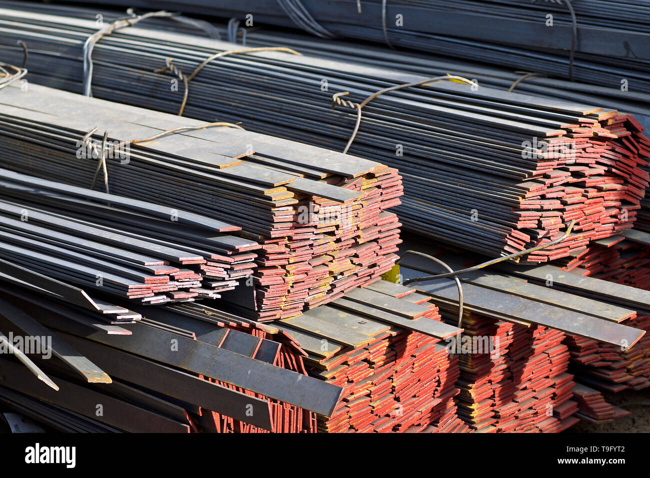 Metal profile strip in packs at the warehouse of metal products, Russia ...