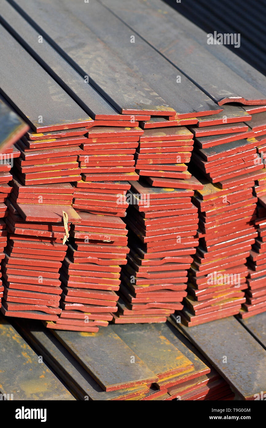Metal profile strip in packs at the warehouse of metal products, Russia ...
