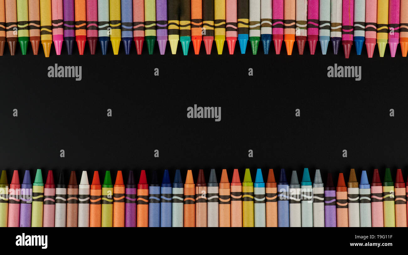Colorful crayons frame background with black copy space Stock Photo - Alamy