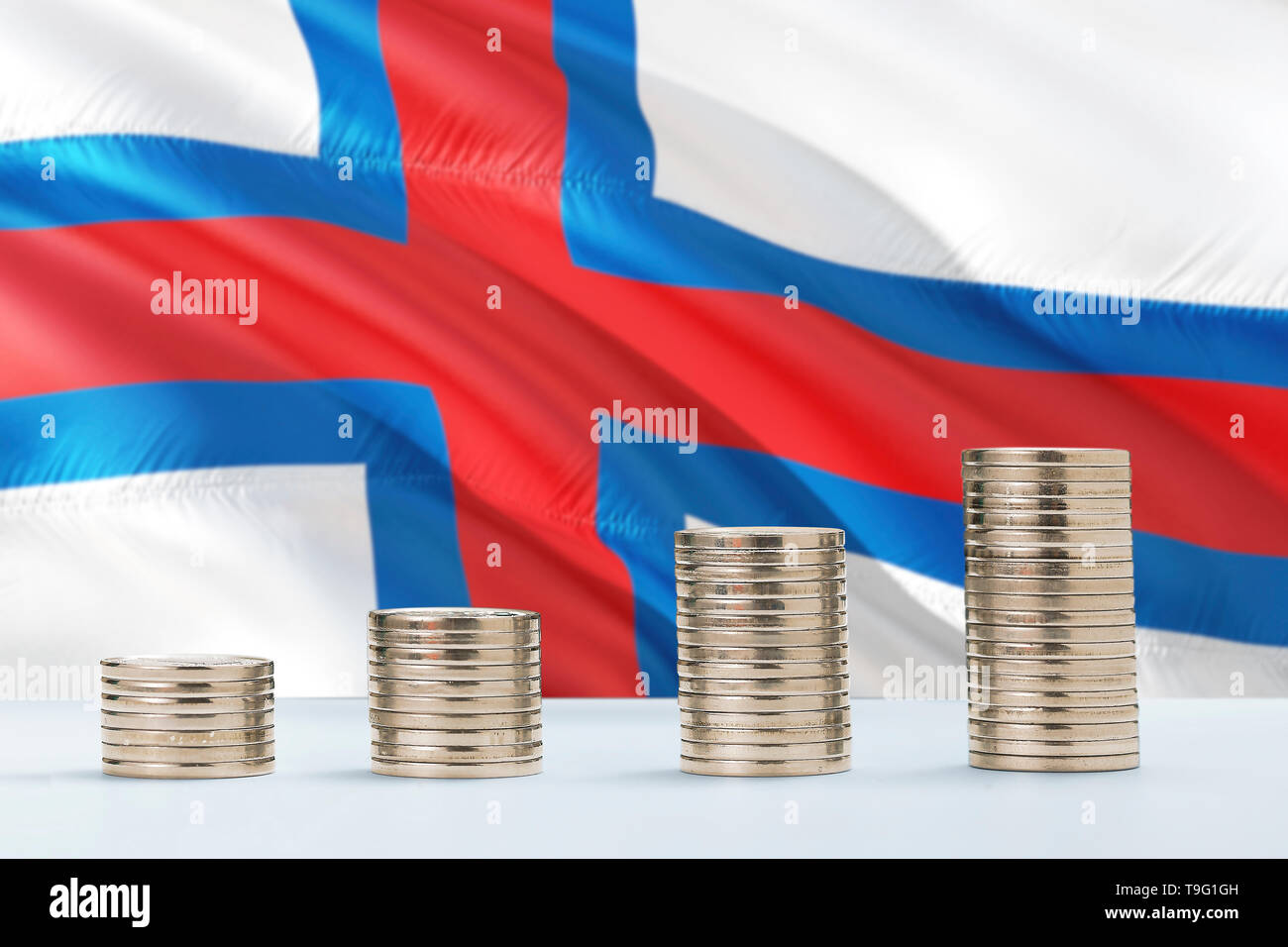 Faroe Islands flag waving in the background with rows of coins for ...