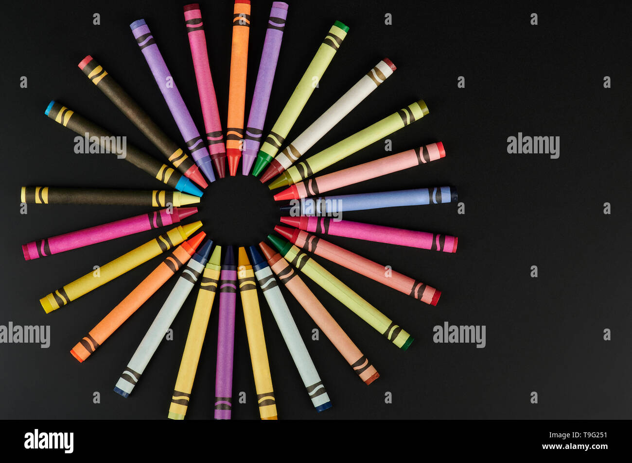 Colorful crayon in circle shape isolated on black background Stock ...