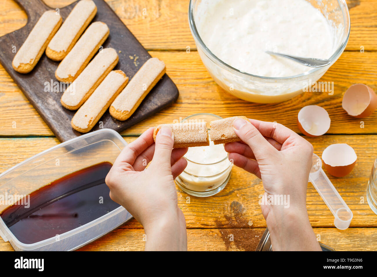 Picture of wooden table with biscuits, coffee Stock Photo - Alamy