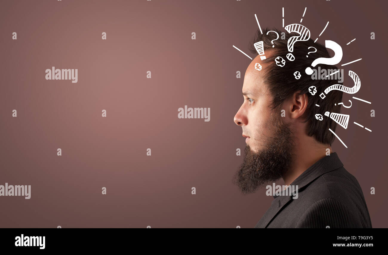 Head with white question marks, and copy space Stock Photo - Alamy