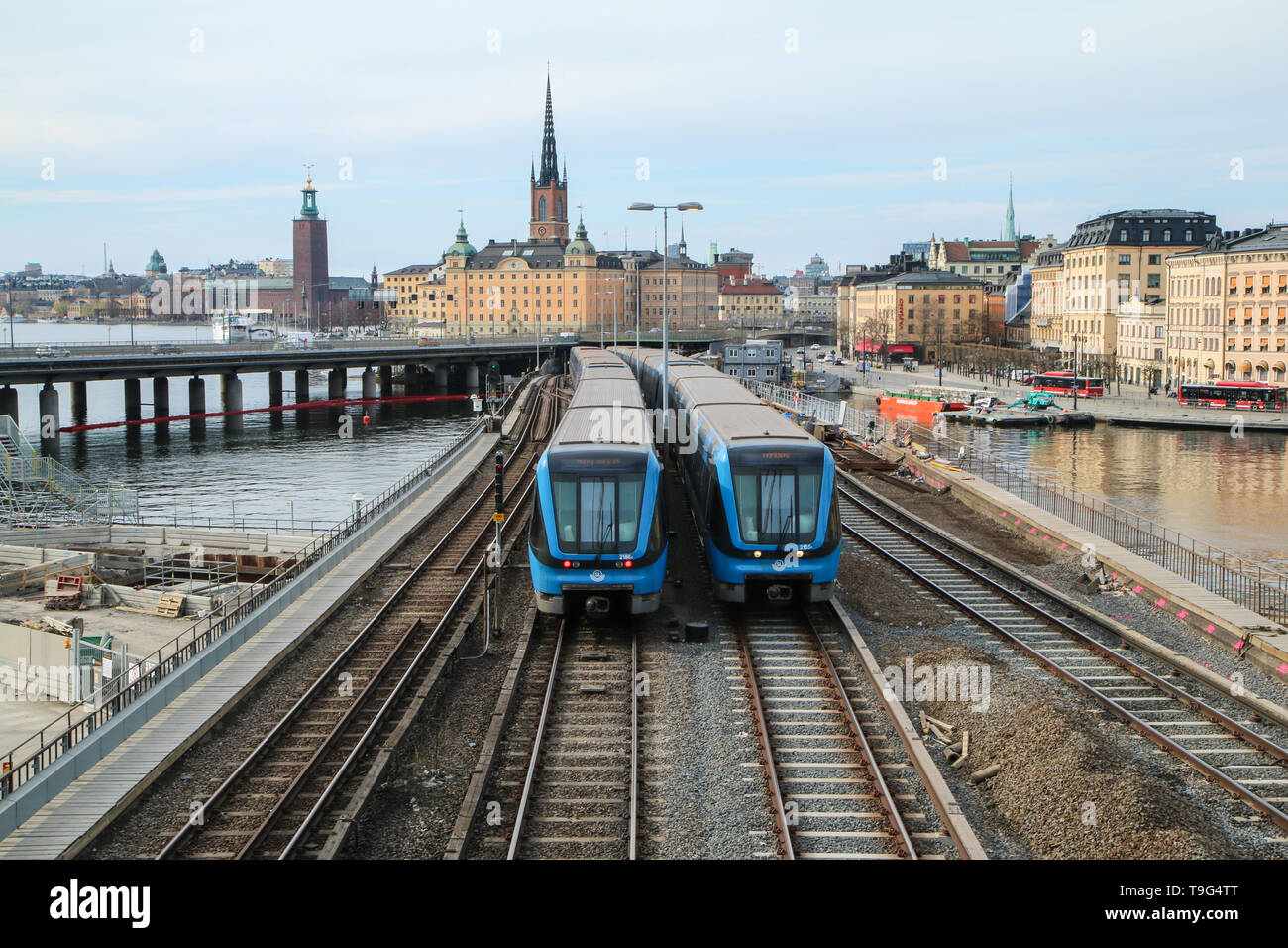 A traditional modern swedish metro train in Stockholm is driving on the ...