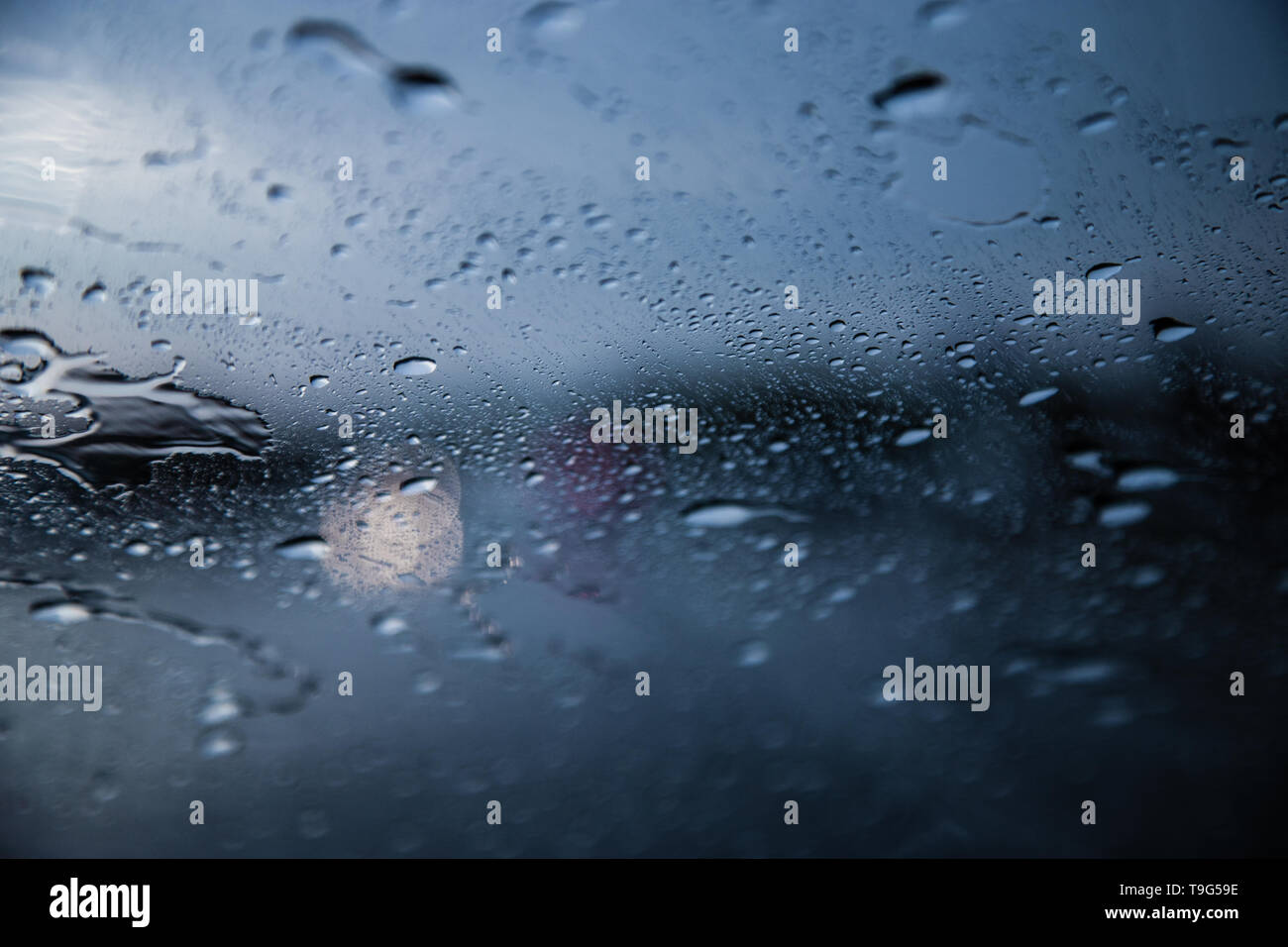 Raindrops on the windshield of a car. Weather forecast. Weather ...