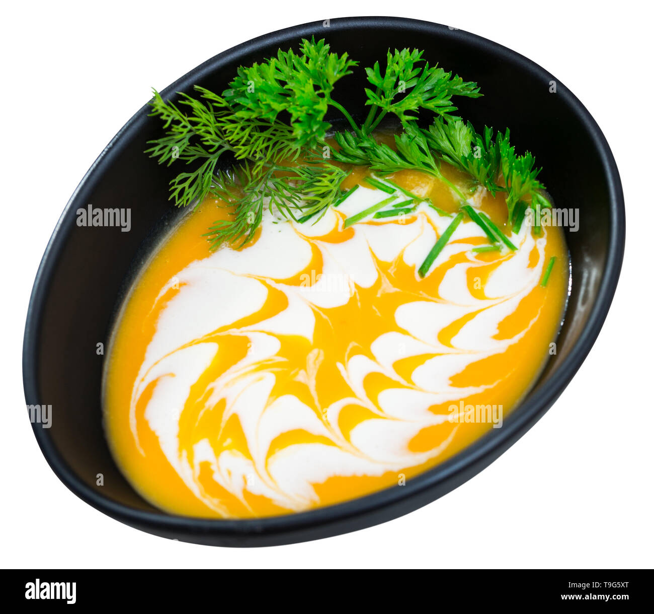 Spicy pumpkin soup puree with ginger. Isolated over white background ...