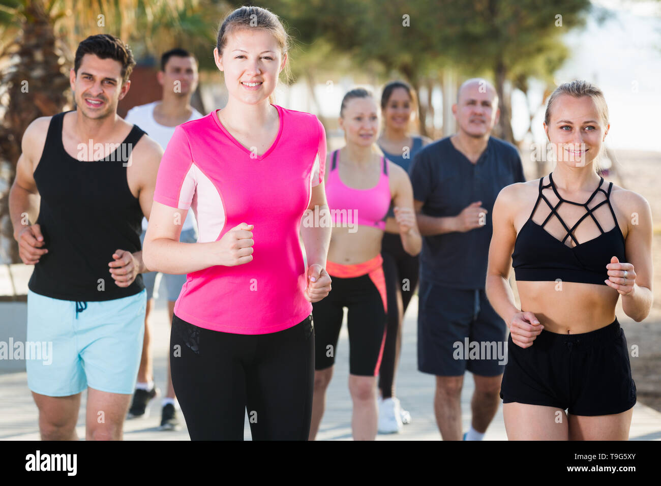 People leading healthy lifestyle, jogging during outdoor workout on ...