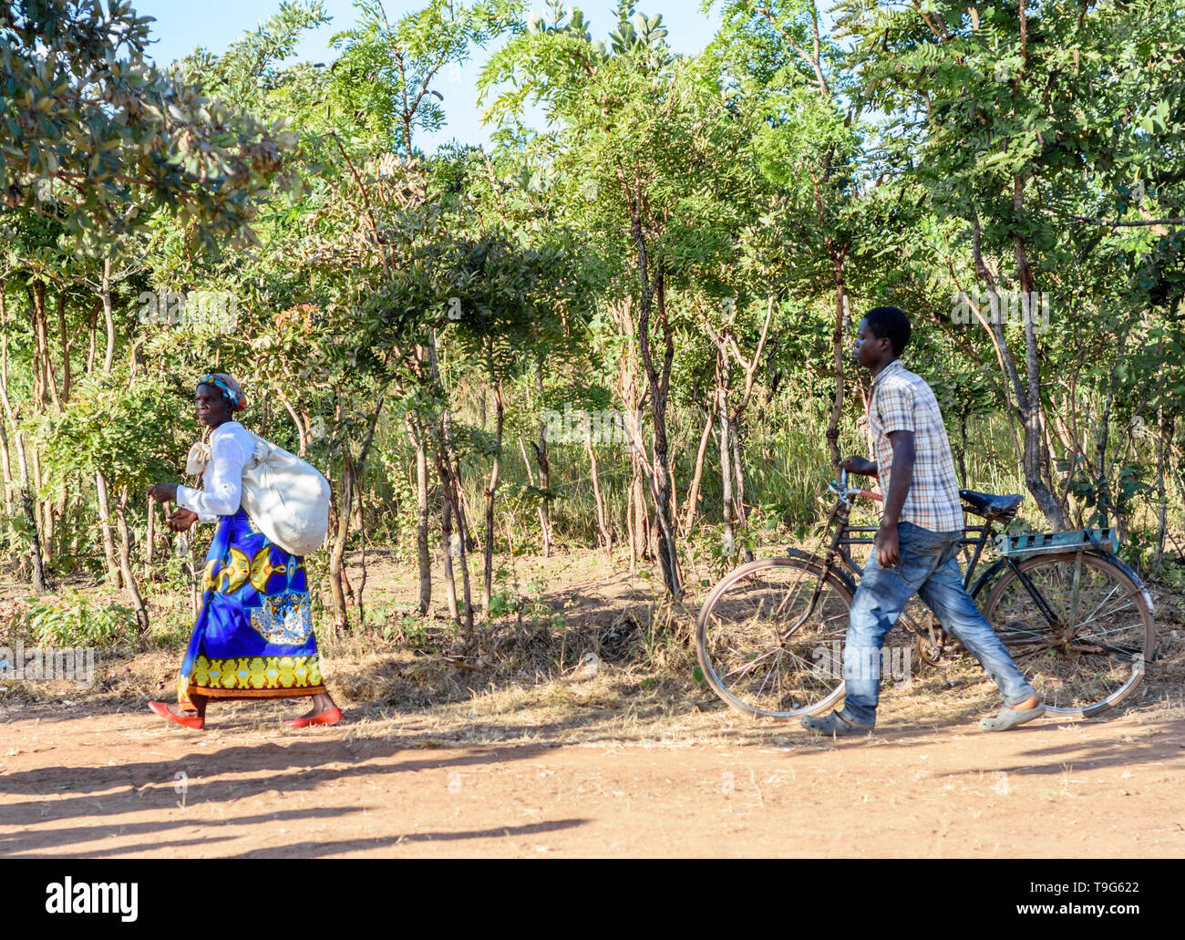 Man carrying woman over shoulder hi-res stock photography and images ...