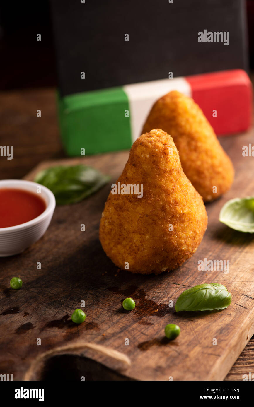 Delicious rice balls made with fried rice. typical dish of sicilian ...