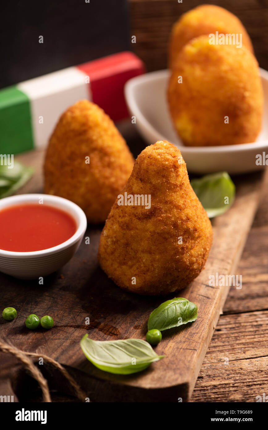 Delicious rice balls made with fried rice. typical dish of sicilian ...