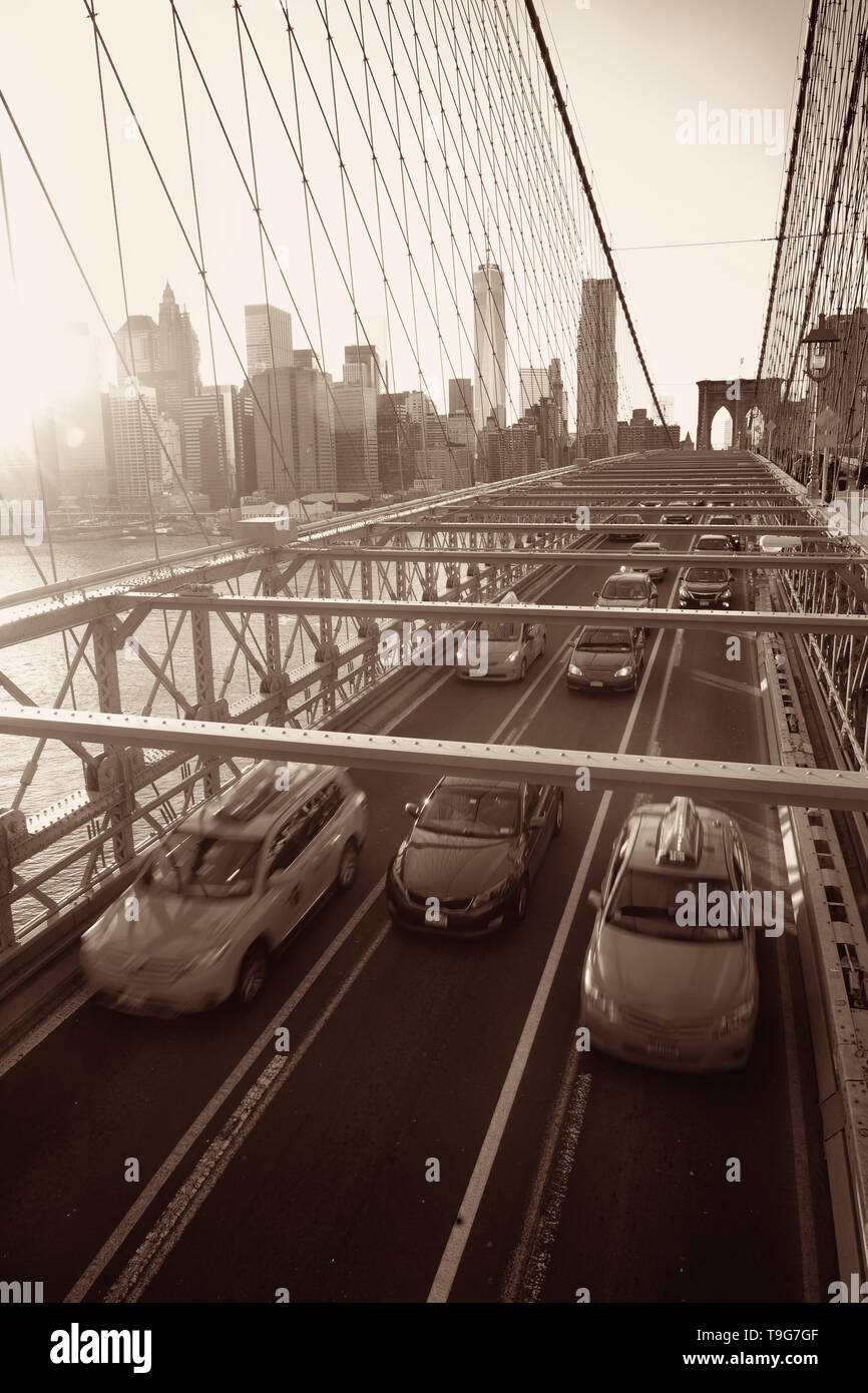 Brooklyn Bridge with traffic in downtown Manhattan New York City Stock ...