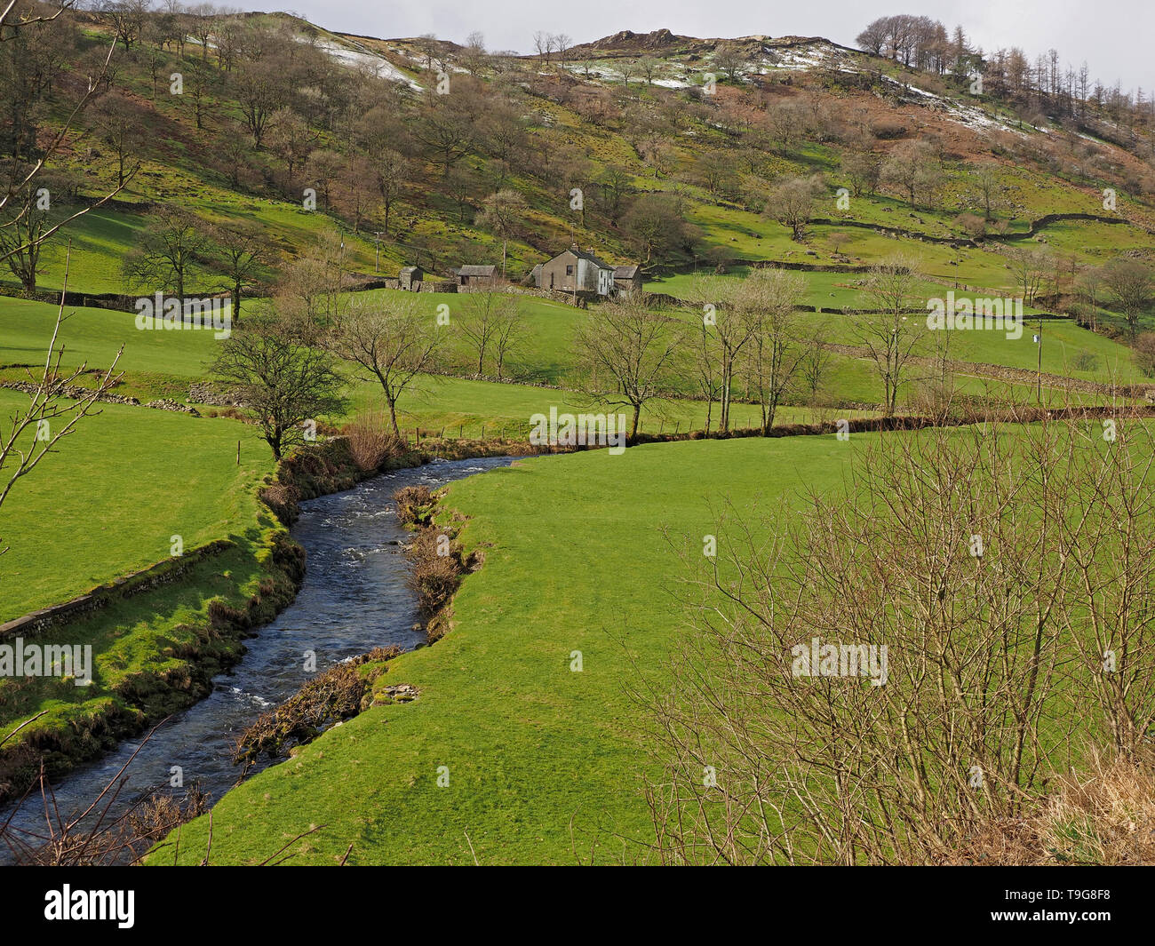 landscape in Long Sleddale Cumbria, England, UK with white farm ...