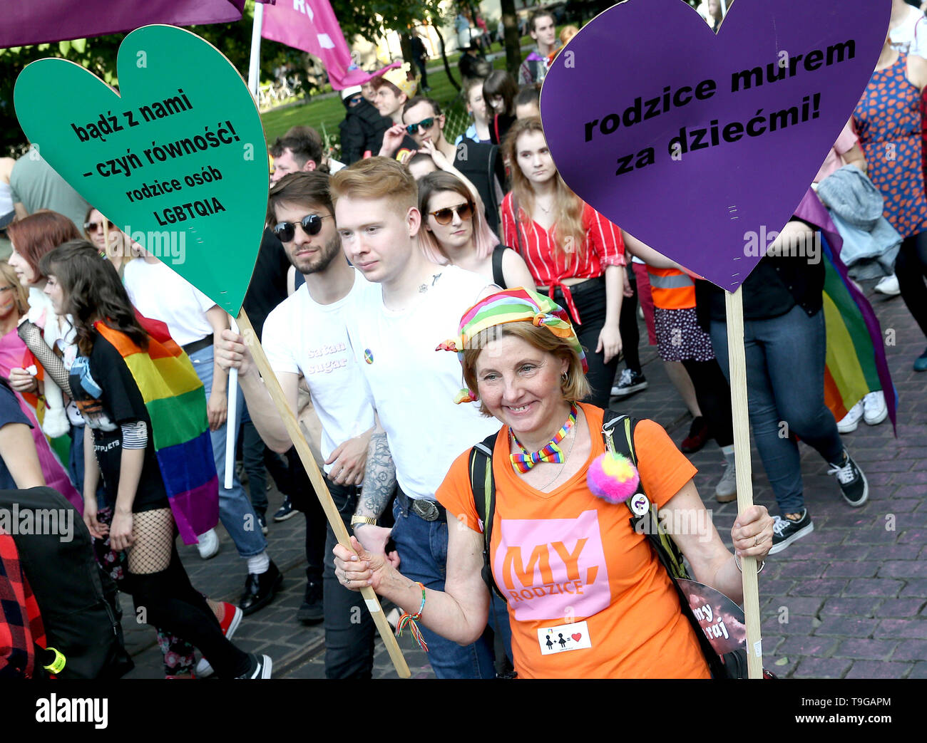 People are seen during the Equality March in Krakow. LGBT people and ...