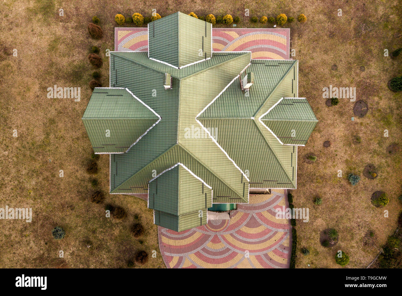 Aerial top view of new residential house cottage with shingle roof on ...