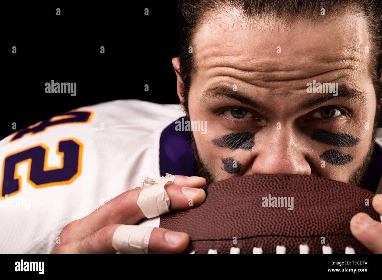 Sport football player head head shot hi-res stock photography and ...