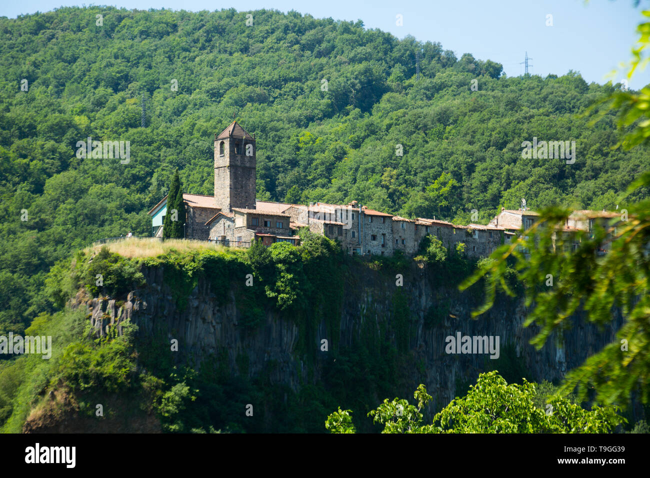 View of Castellfollit de la Roca, medieval Catalan hamlet on cliff in ...
