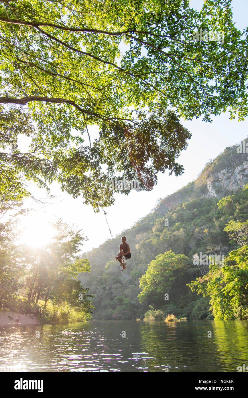Rope swing fun on the Macal River, Black Rock Lodge, San Ignacio, Cayo ...