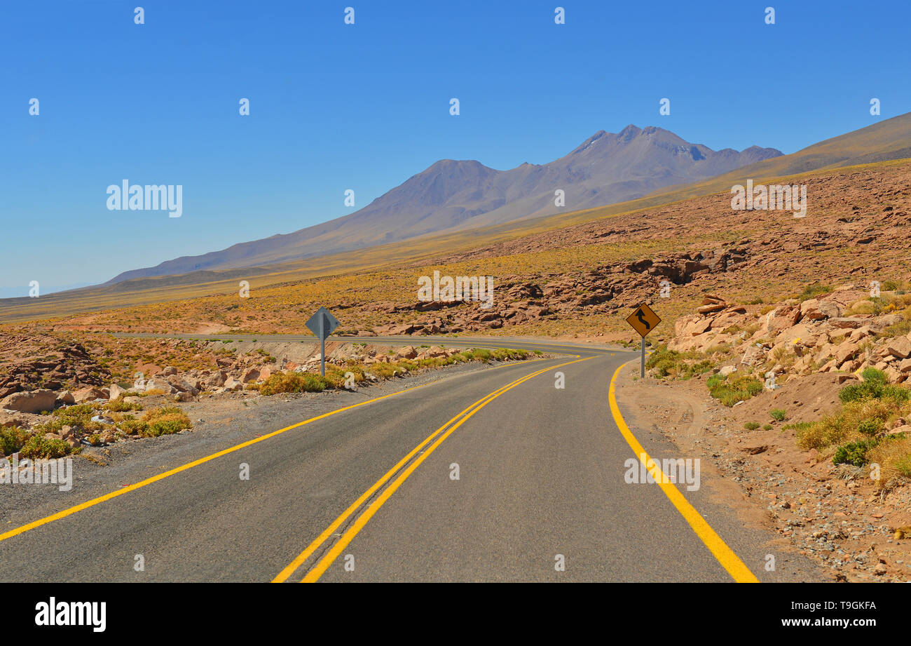 On the road on a highway in the Atacama Desert, Chile, South America ...