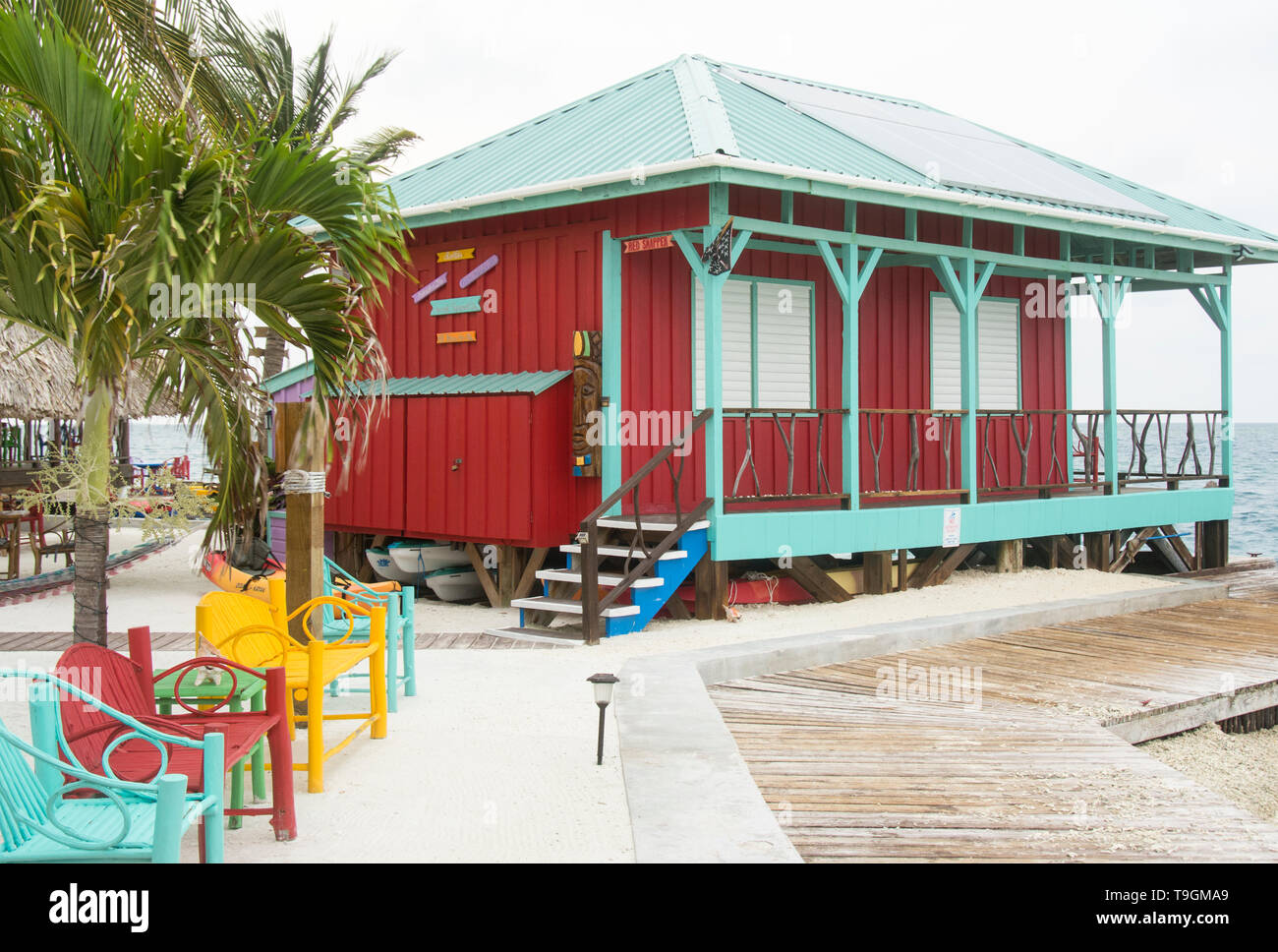 Colorful cabins and palm trees at the idyllic King Lewey's Island ...