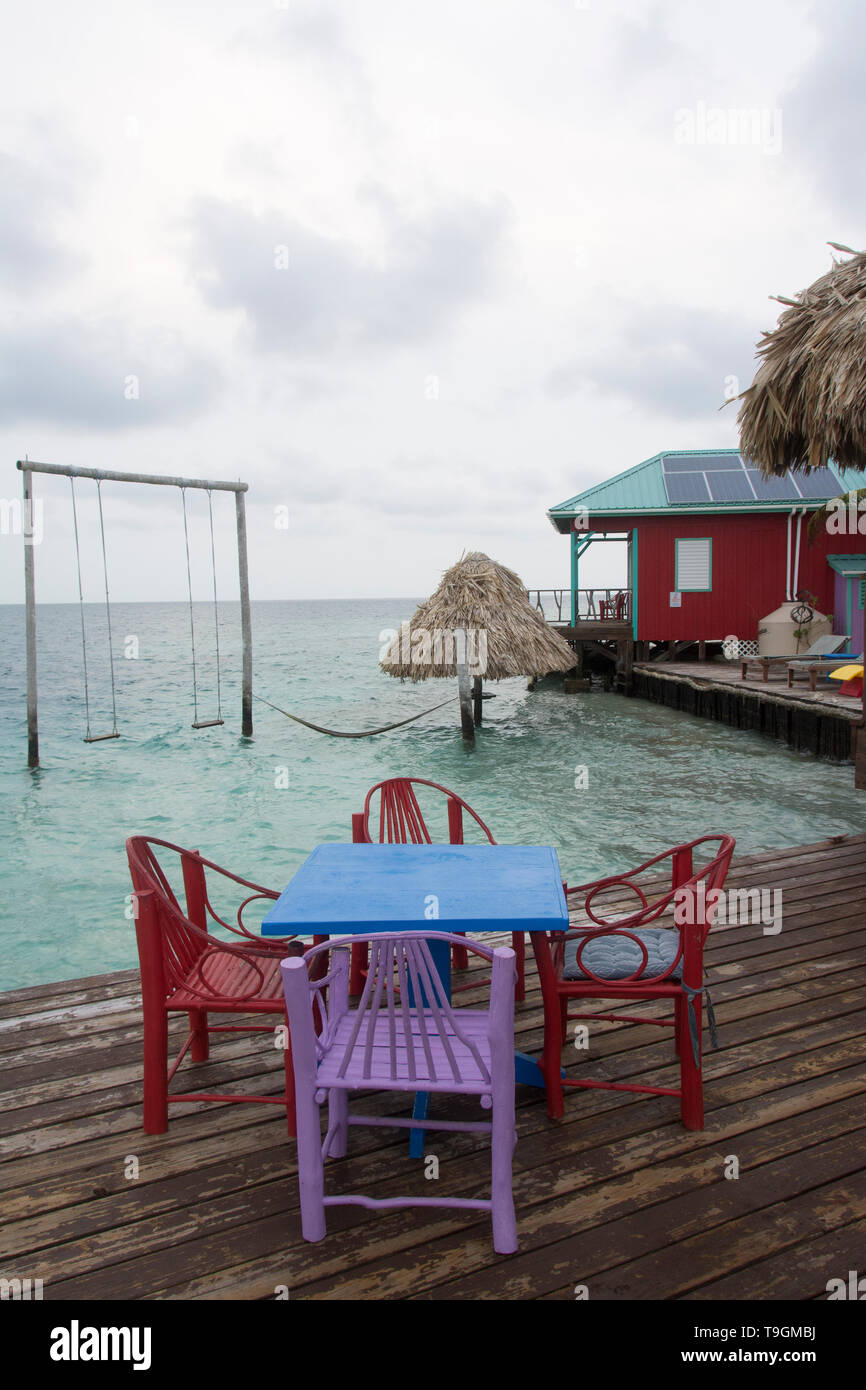 Colorful cabins and palm trees at the idyllic King Lewey's Island ...