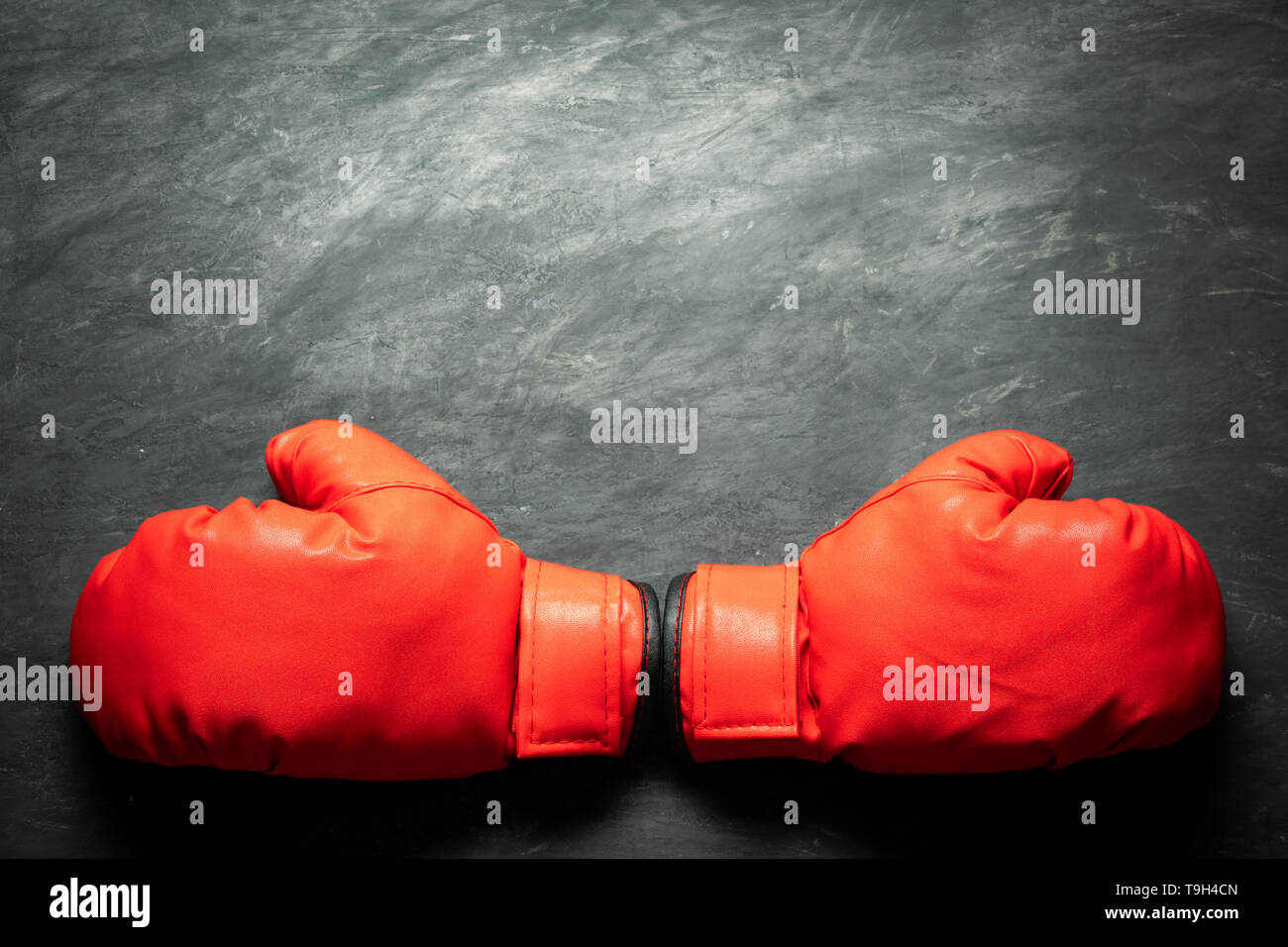 Boxing Gloves on black cement background. Concept of fighting or boxing ...