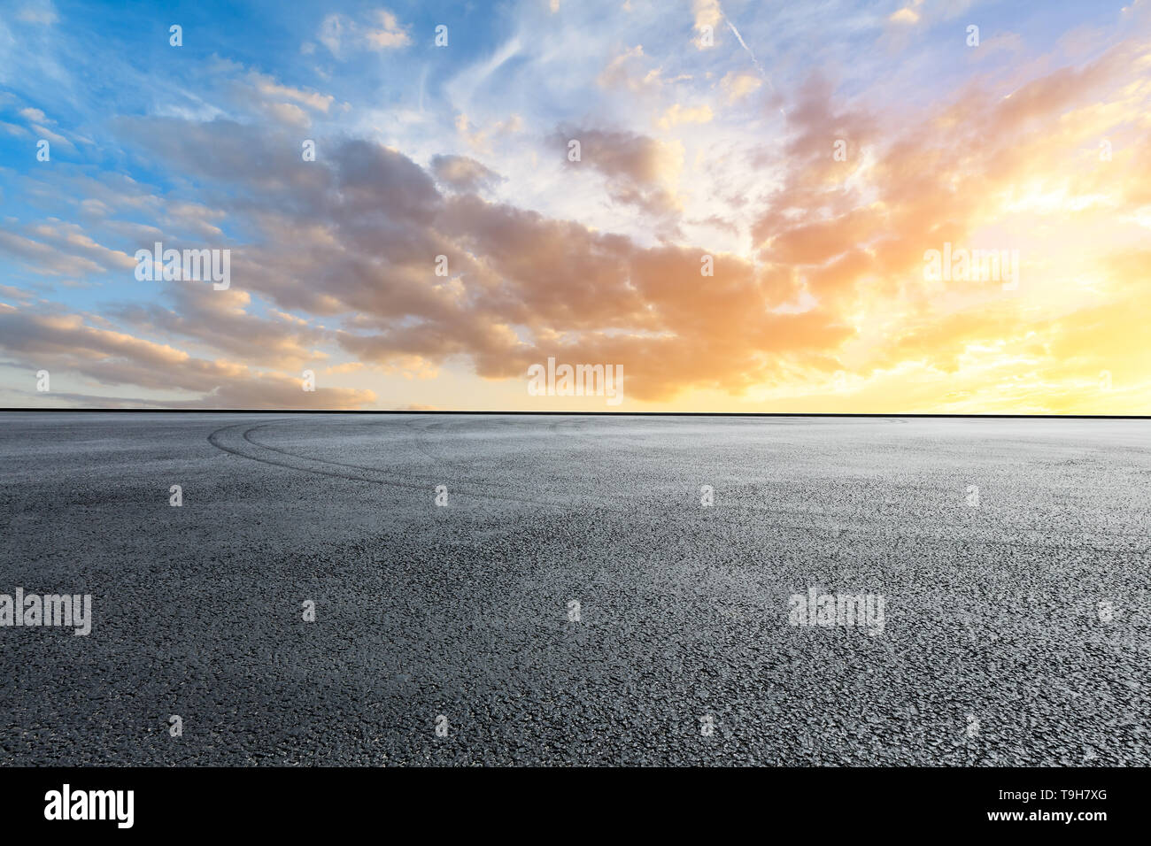 Empty race track and sky nature landscape at sunrise Stock Photo - Alamy