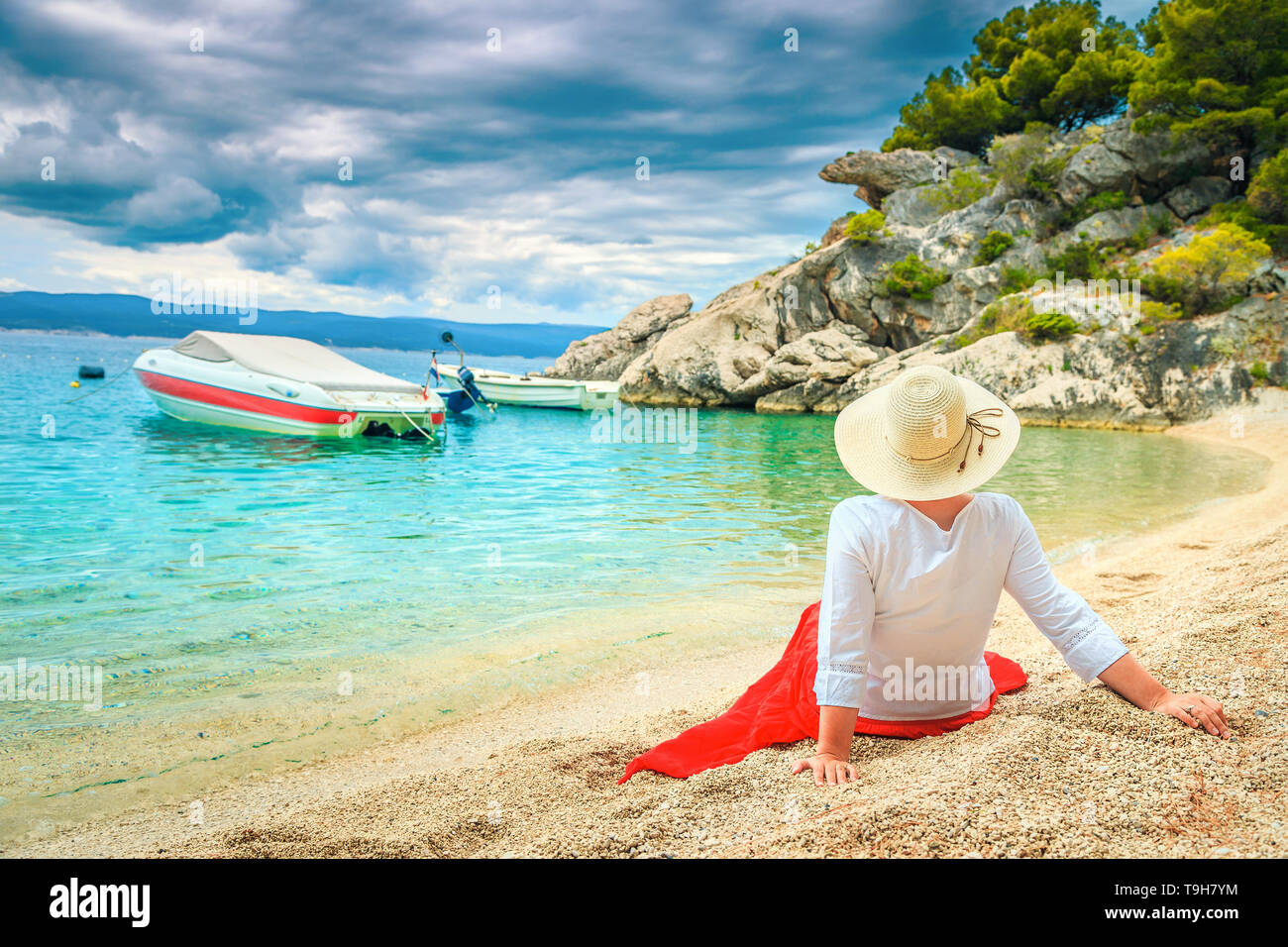 Woman relaxing on holiday hi-res stock photography and images - Alamy