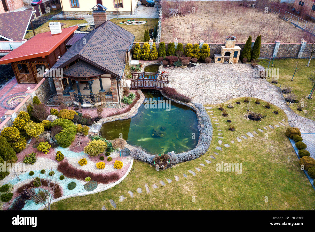 Aerial view of beautifully landscaped recreation house cottage complex ...