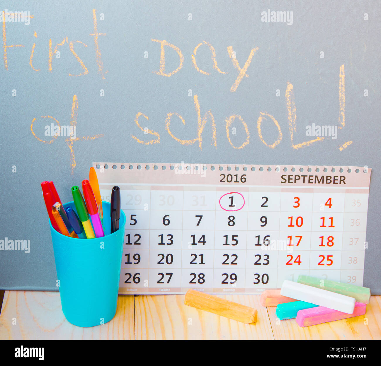First day at school writing on the blackboard, calendar, stationery ...
