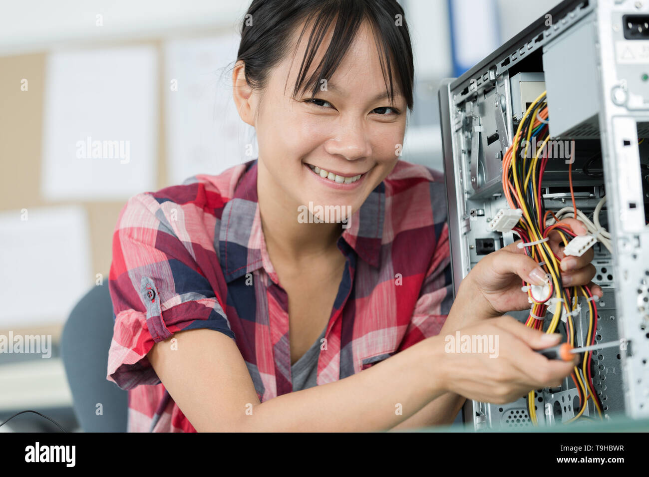 female technician working with transistor Stock Photo - Alamy