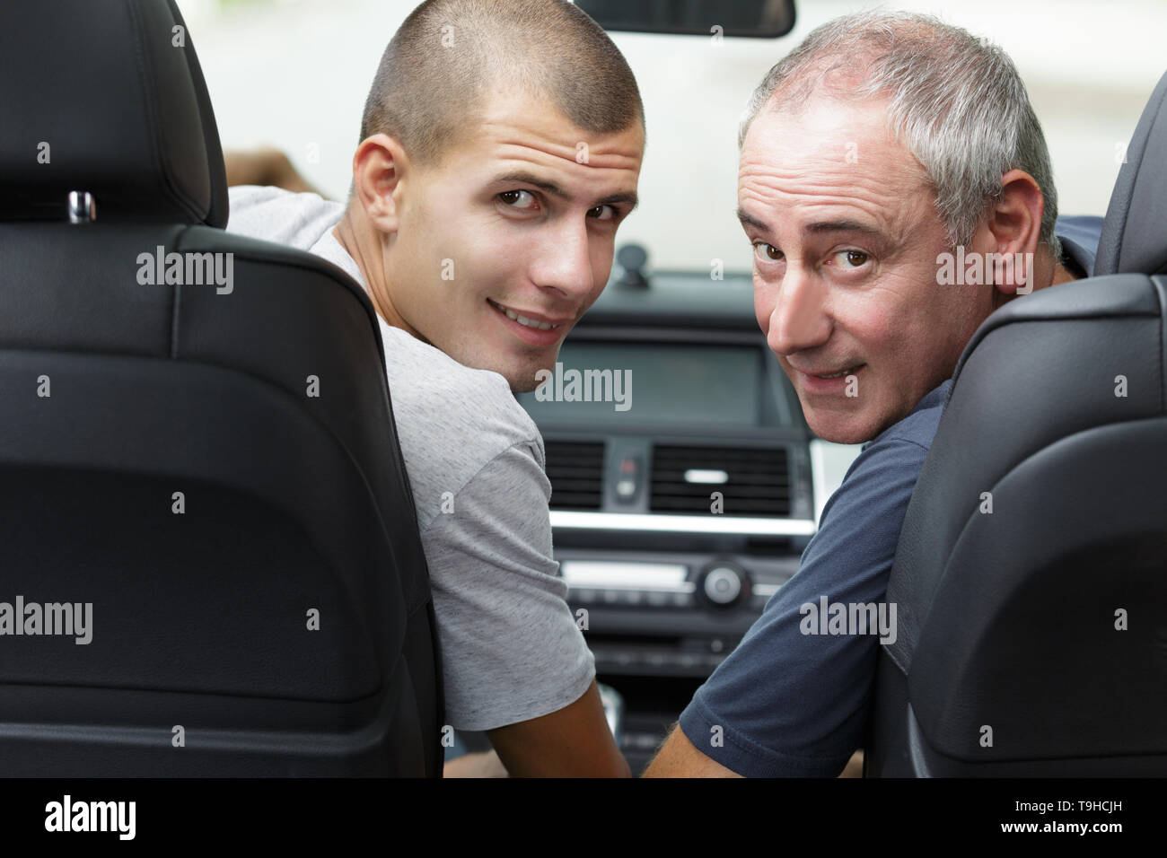 looking back and smiling Stock Photo - Alamy