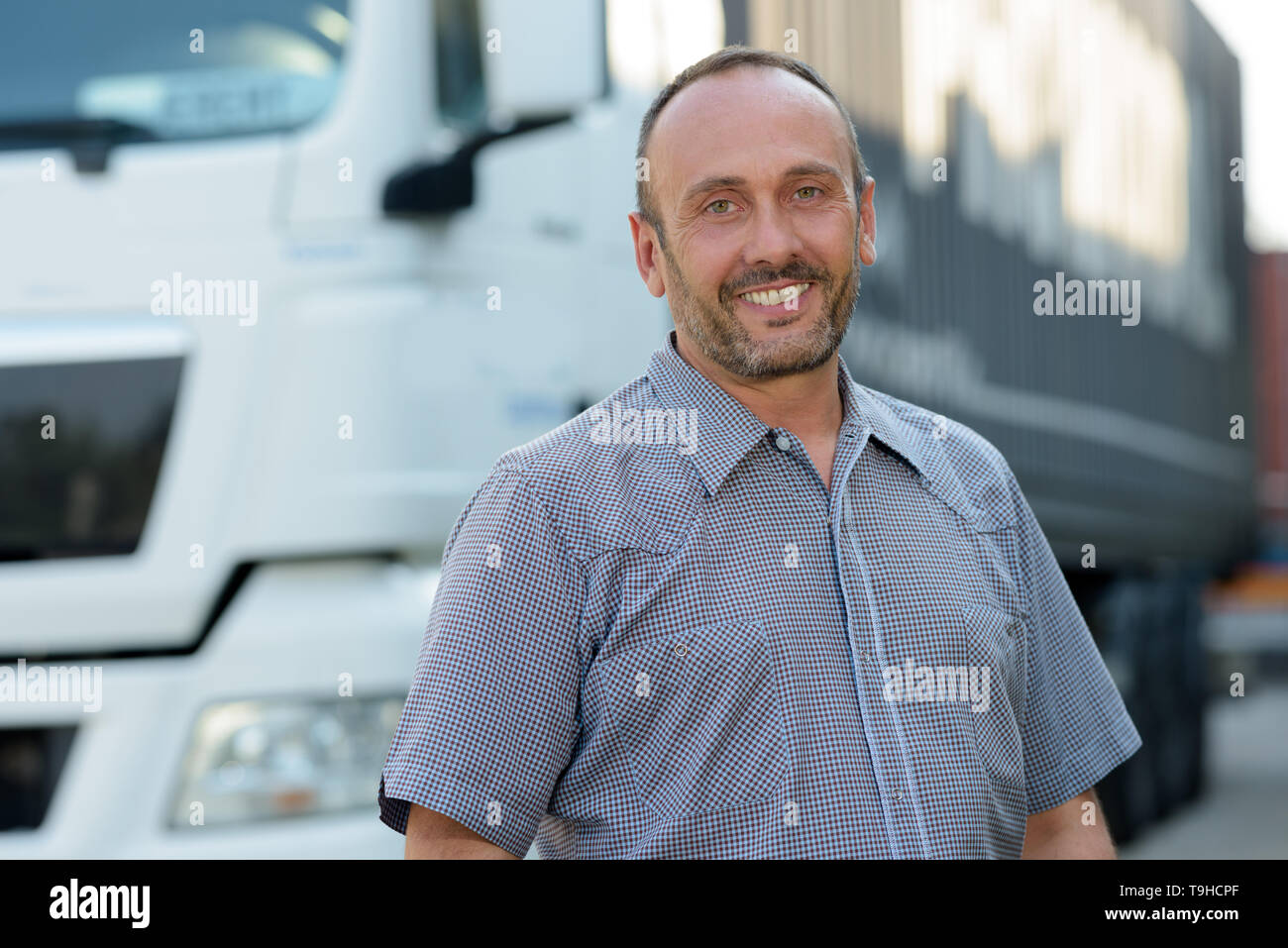 smiling truck driver Stock Photo - Alamy