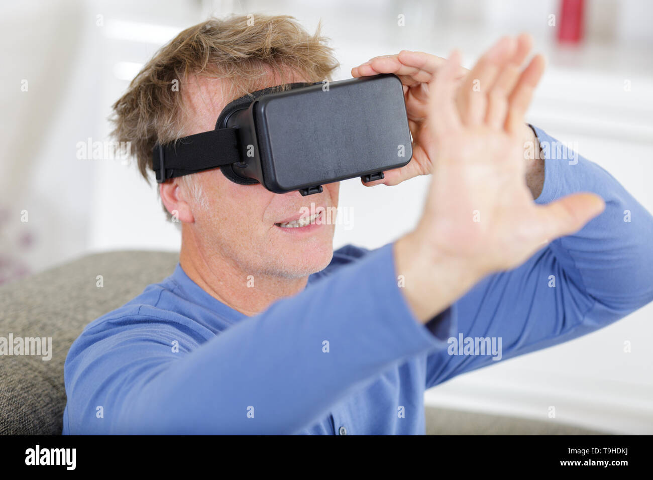 Virtual reality gaming, old person hi-res stock photography and images ...