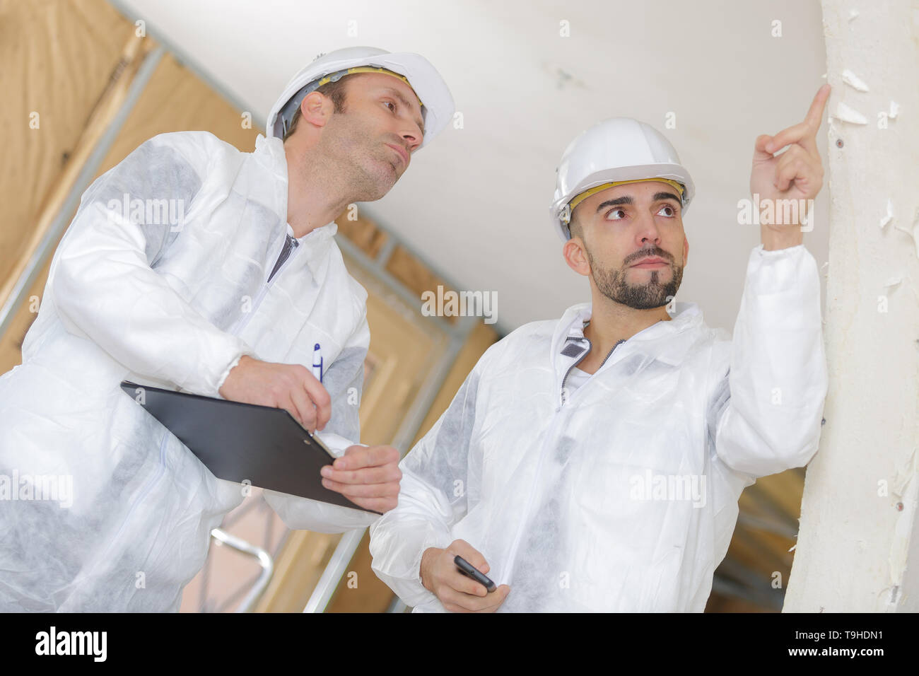 builders concreter joiners at work Stock Photo - Alamy