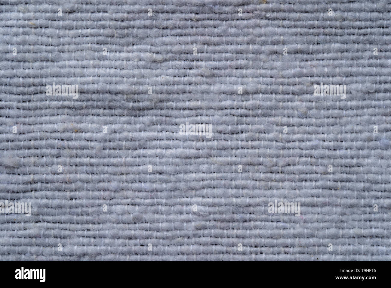 White fabric texture or background. Detail of asian white carpet in ...