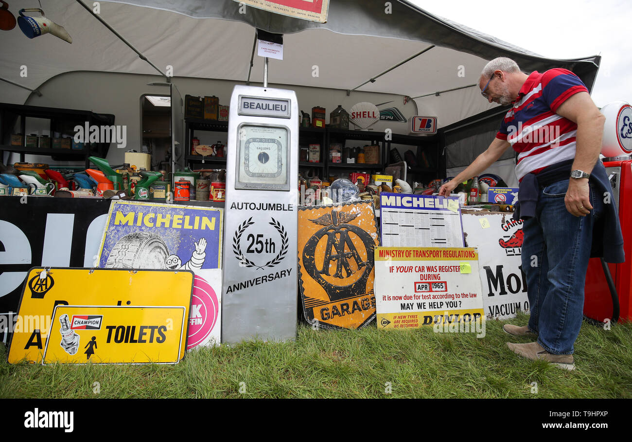 A person looks at signs for sale at the Spring Autojumble at the ...