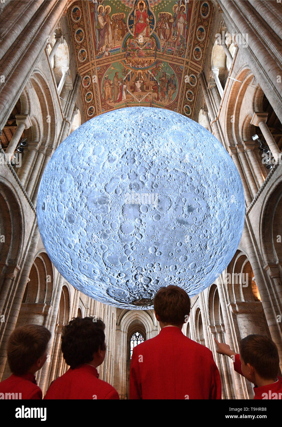 Choristers view Luke Jerram's 'Museum of the Moon' installation at Ely ...