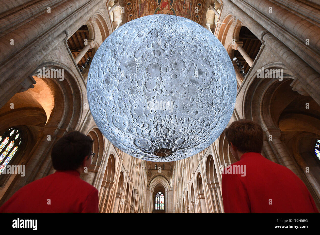 Choristers view Luke Jerram's 'Museum of the Moon' installation at Ely ...