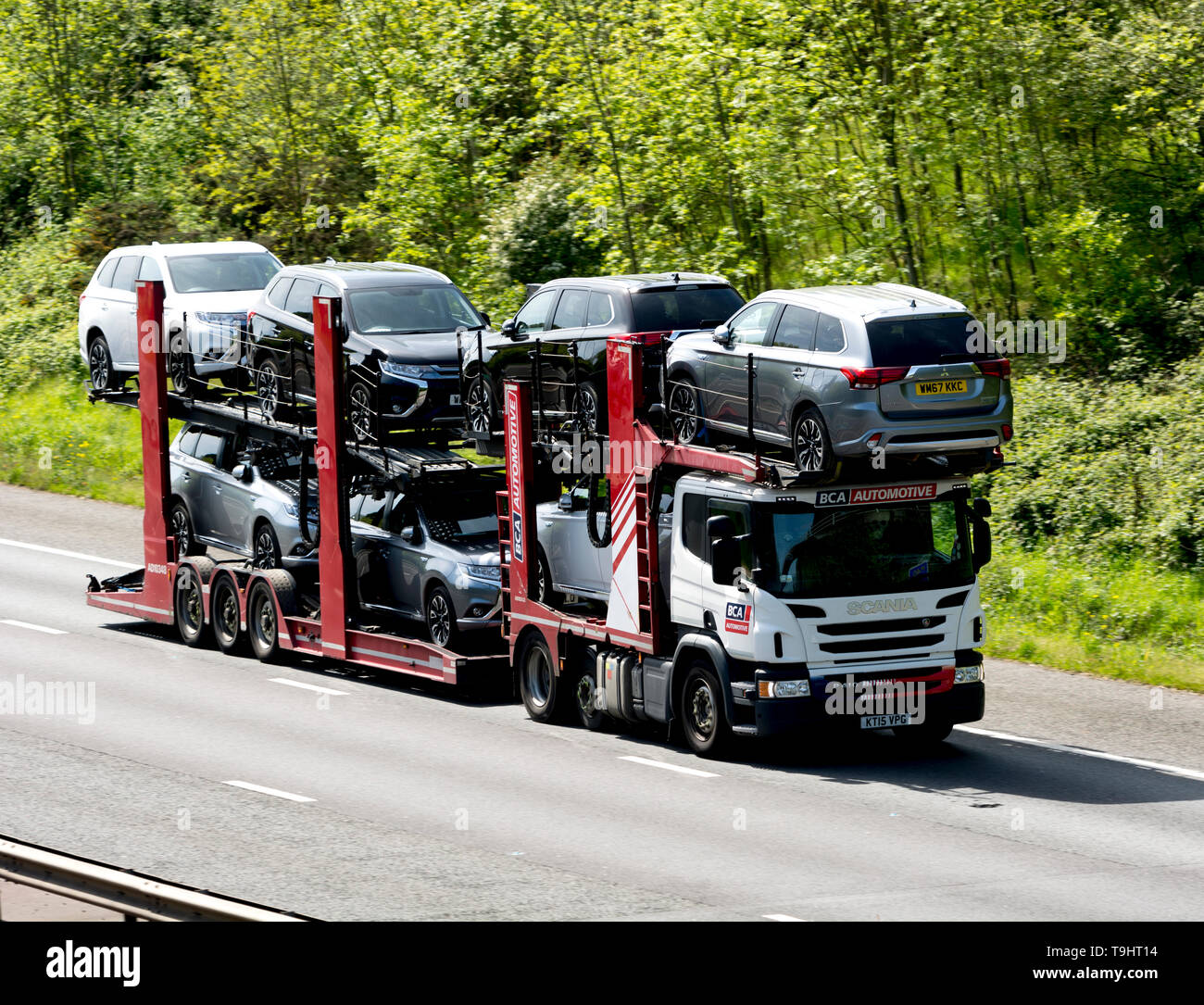 Truck carrying cars hi-res stock photography and images - Alamy